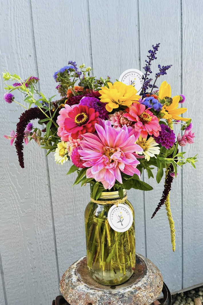 Our offering of locally grown bouquets changes with the growing season ...